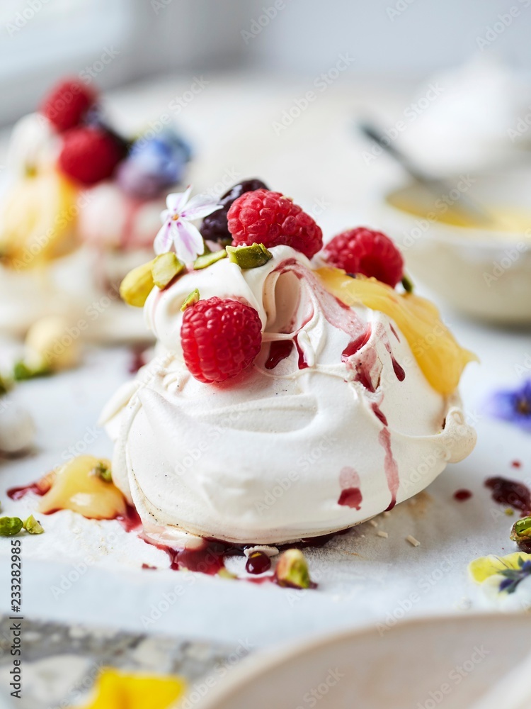 Lemon, raspberry, pistachio meringue with lemon curd, poached ...