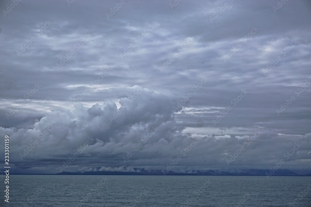 Storm Clouds Gathering Over Water