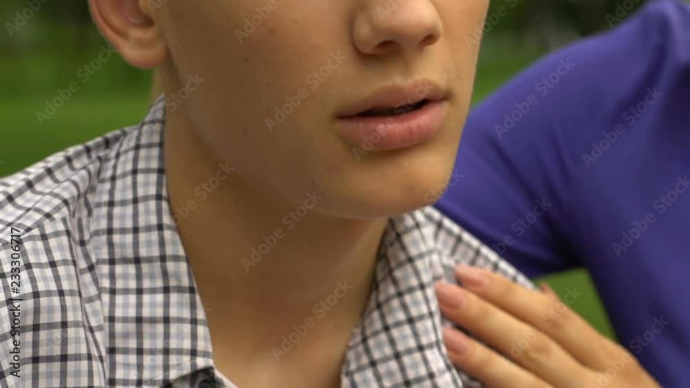 Caring lady embraces and supports teen boy in time of trouble, bullying ...