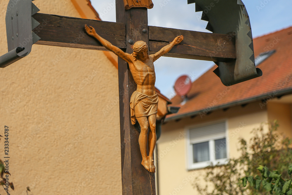 Jesus Christ crucified. An ancient wooden sculpture. Stock Photo ...
