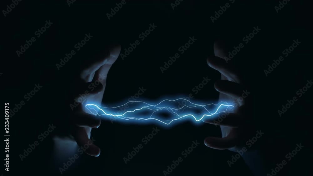 Electrical discharge between the hands. Lightning Strikes on Black ...