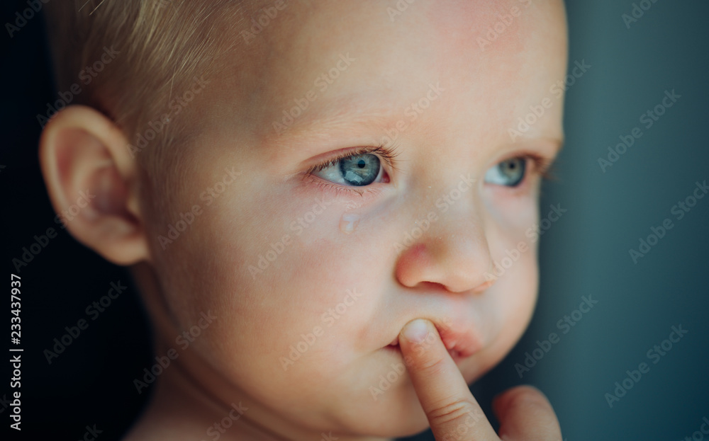 Foto de He is a cry baby. Little baby crying. Baby with tear rolling ...