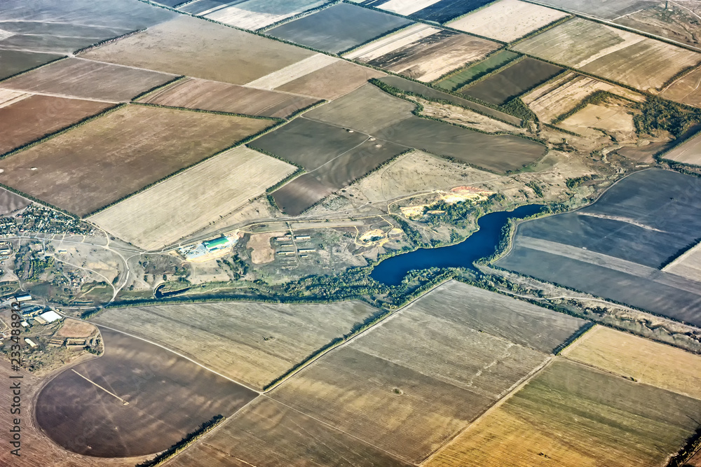 Aerial satellite landscape air view of rural land in late autumn with ...