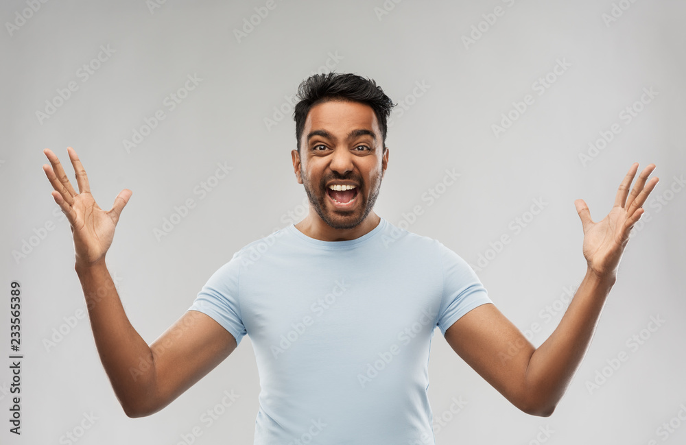 success, emotion and expression concept - happy young indian man ...