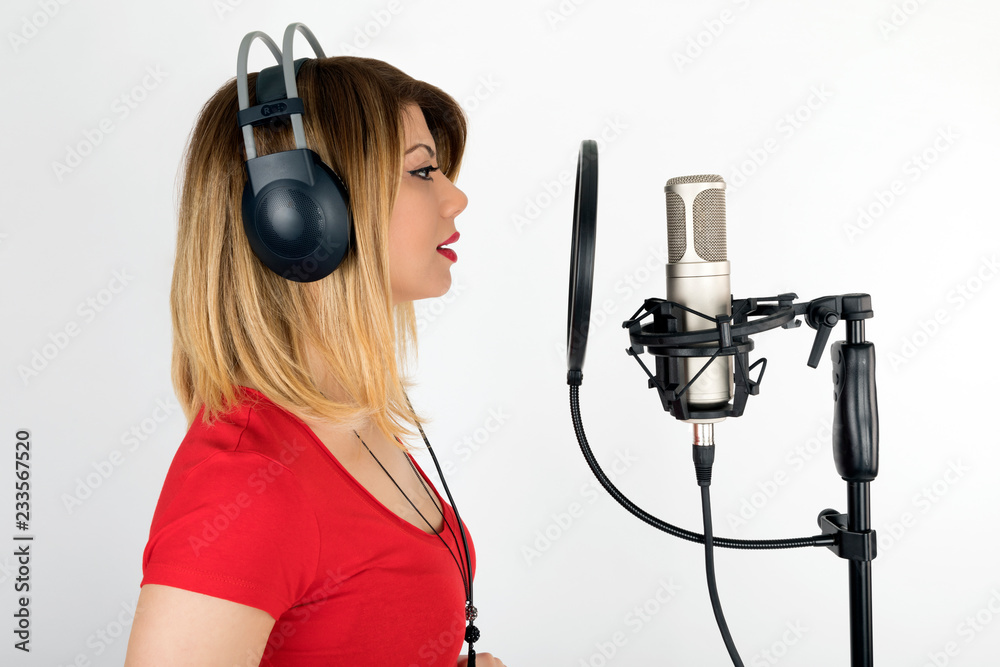 Voice acting woman performing a dubbing scene, isolated white ...