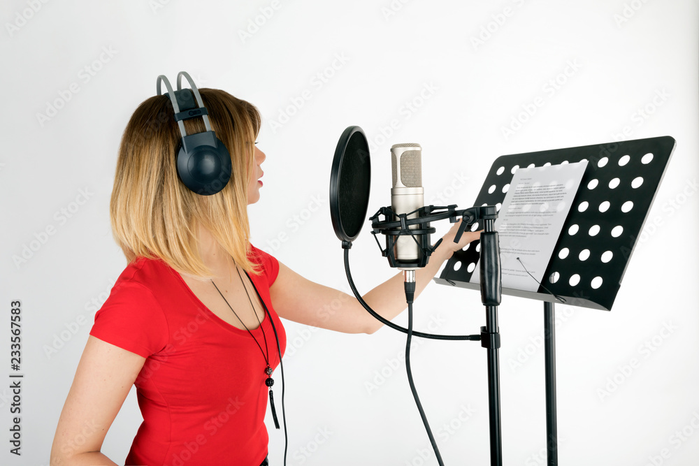Voice acting woman performing a dubbing scene, isolated white ...