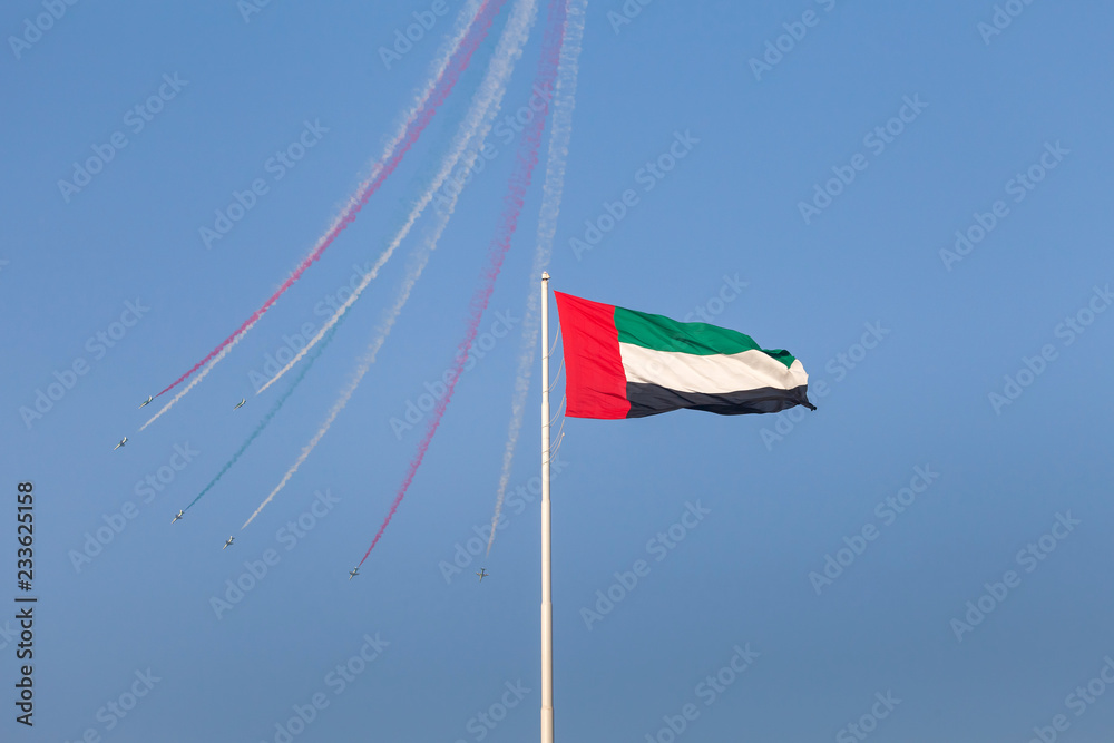 Aerobatic team flying over UAE flag in Abu Dhabi. National day ...