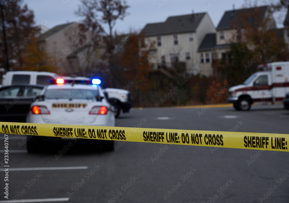 Police Line. Area blocked off as a crime scene. Stock Photo | Adobe Stock
