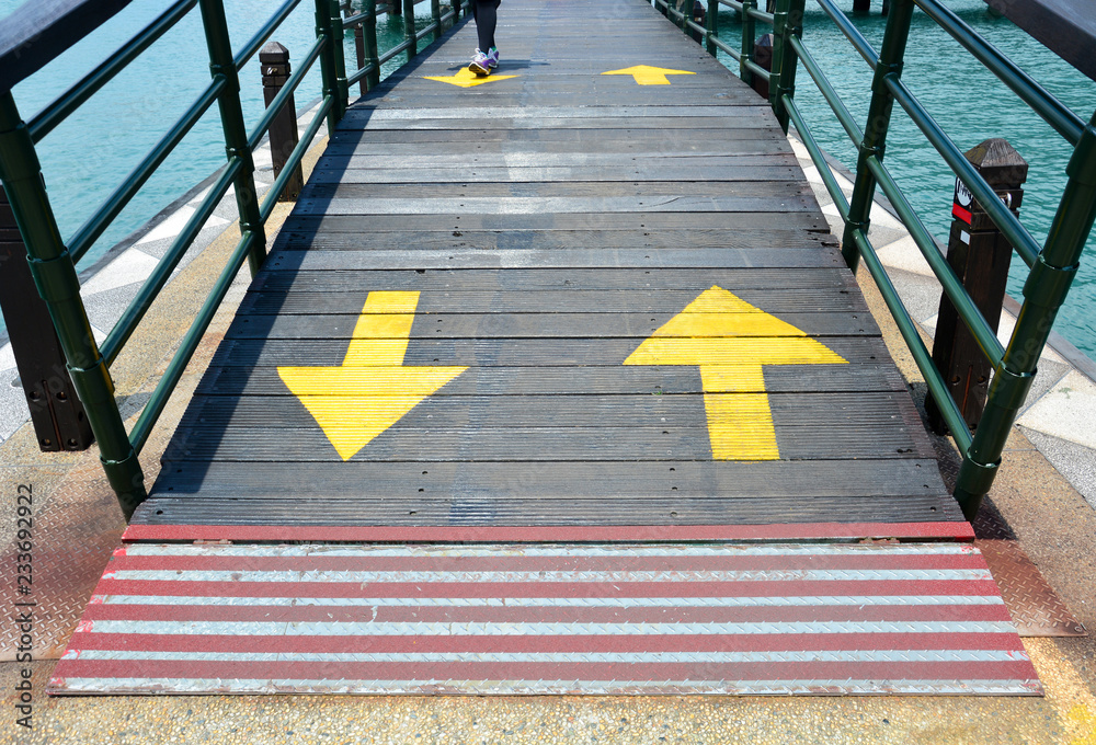 red line at the start-end point and two way yellow traffic arrows sign ...