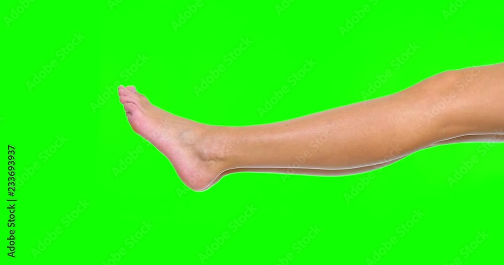 Relaxed young woman feeling her smooth legs, for a skincare advert ...