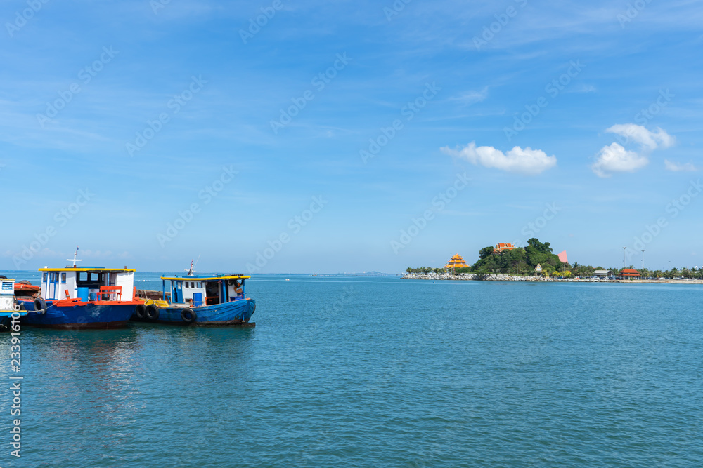 The view of the small island in the distance with the sea and the clear ...