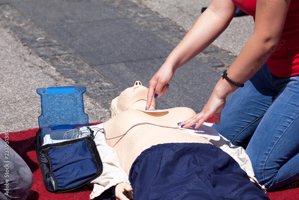 First aid training using automated external defibrillator device - AED ...