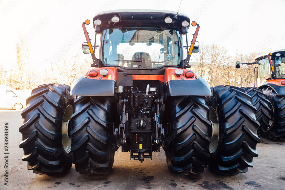 Rear view of modern agricultural tractor. Hydraulic hitch. Hydraulic ...