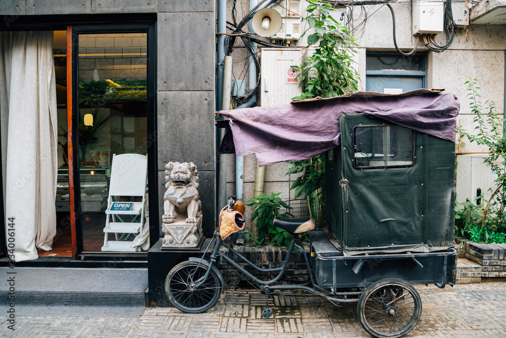 Chinese old street Hutong and traditional rickshaw in Beijing, China ...