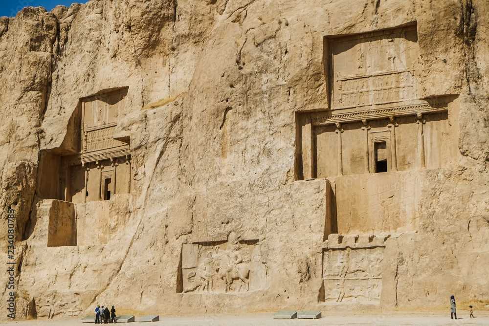 Ancient Iranian rock reliefs Naqsh-e Rustam shows large tombs cut high ...