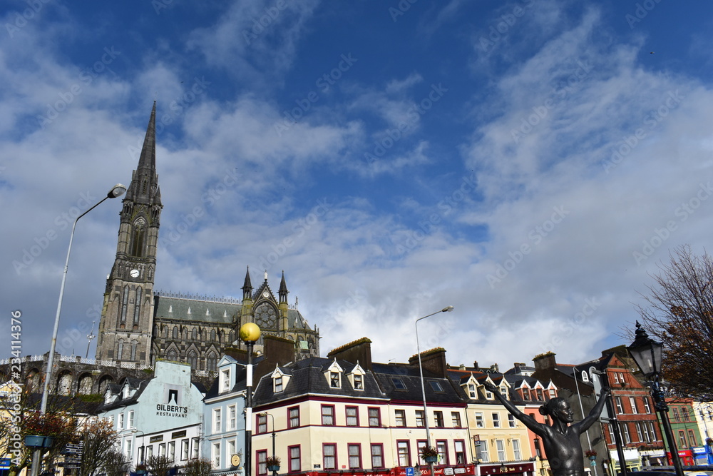 The pretty port town of Cobh with its colourful houses and lofty ...