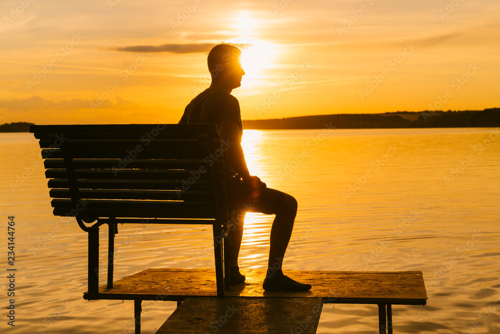 Man Sitting On Bench Silhouette