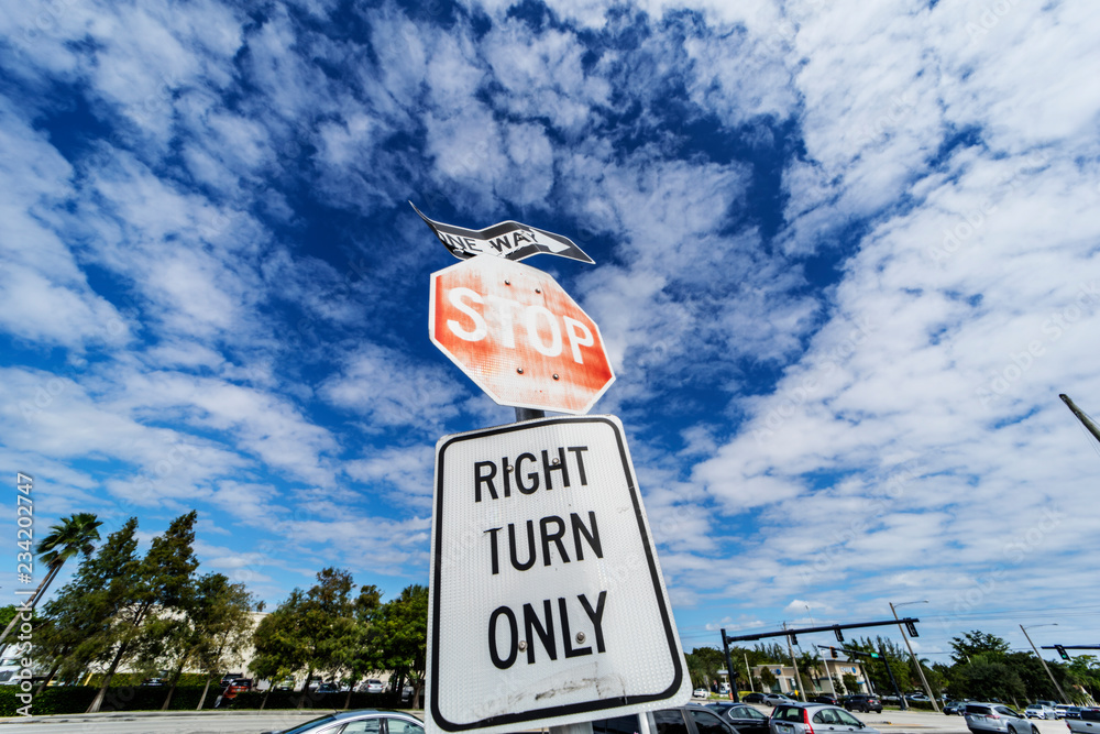 One Way, Stop, and Right Turn Only sign Stock Photo | Adobe Stock