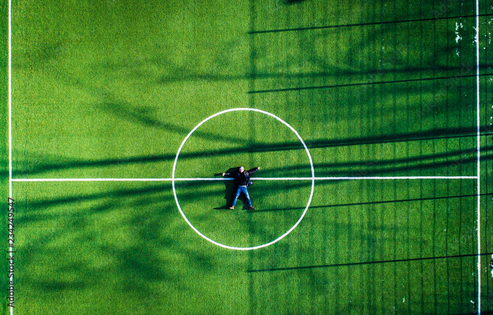 Football Laying On Field