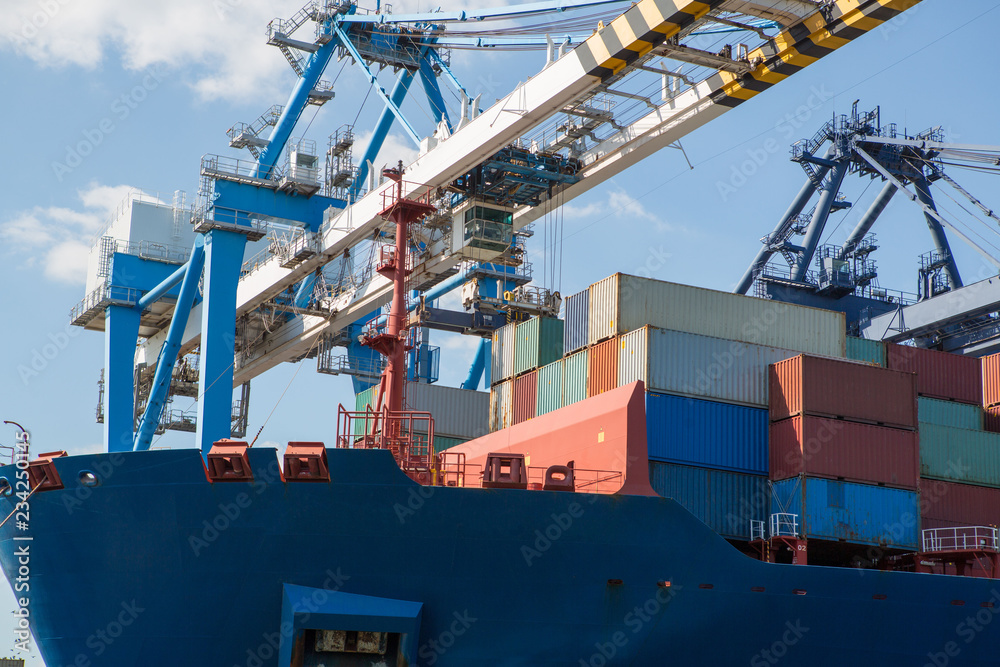 Container ship in port at container terminal close-up. Ships of ...