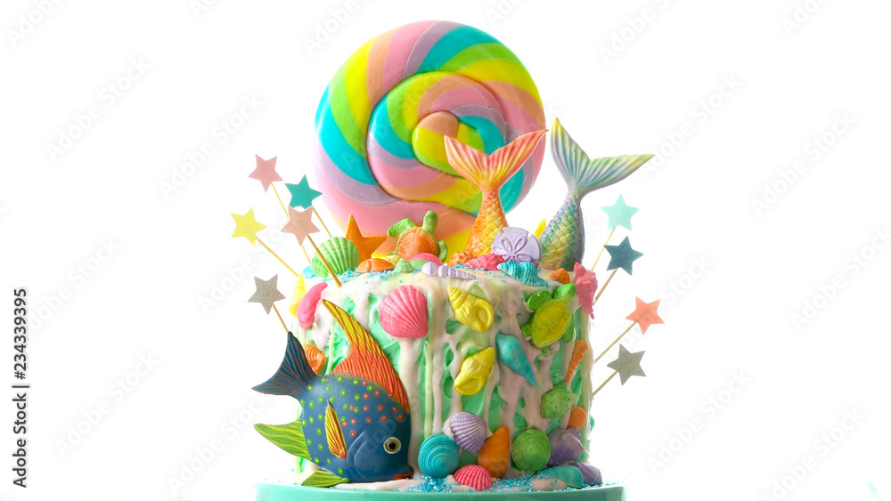 Mermaid theme candyland cake with colorful glitter tails, shells and ...