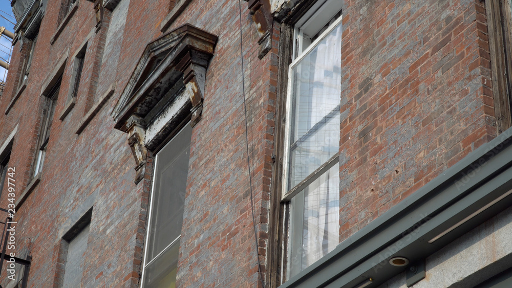 Close up exterior DX establishing photo of old vintage architecture ...