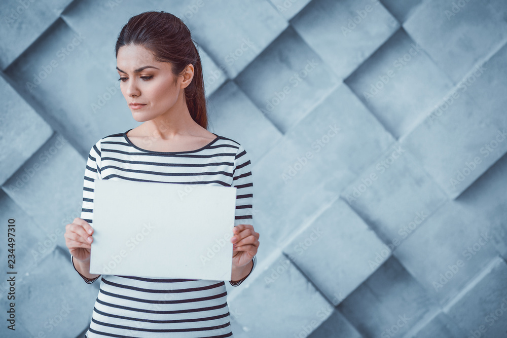 Posture of humility. Beautiful head down woman carrying white bare ...