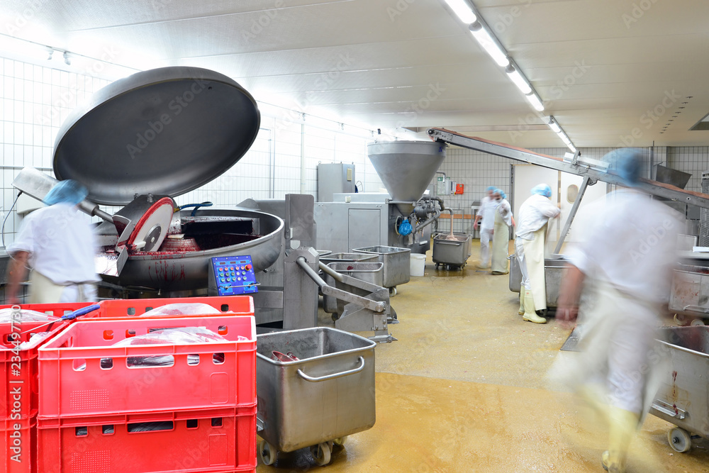 large-scale butchery - food industry workers - meat and sausage ...