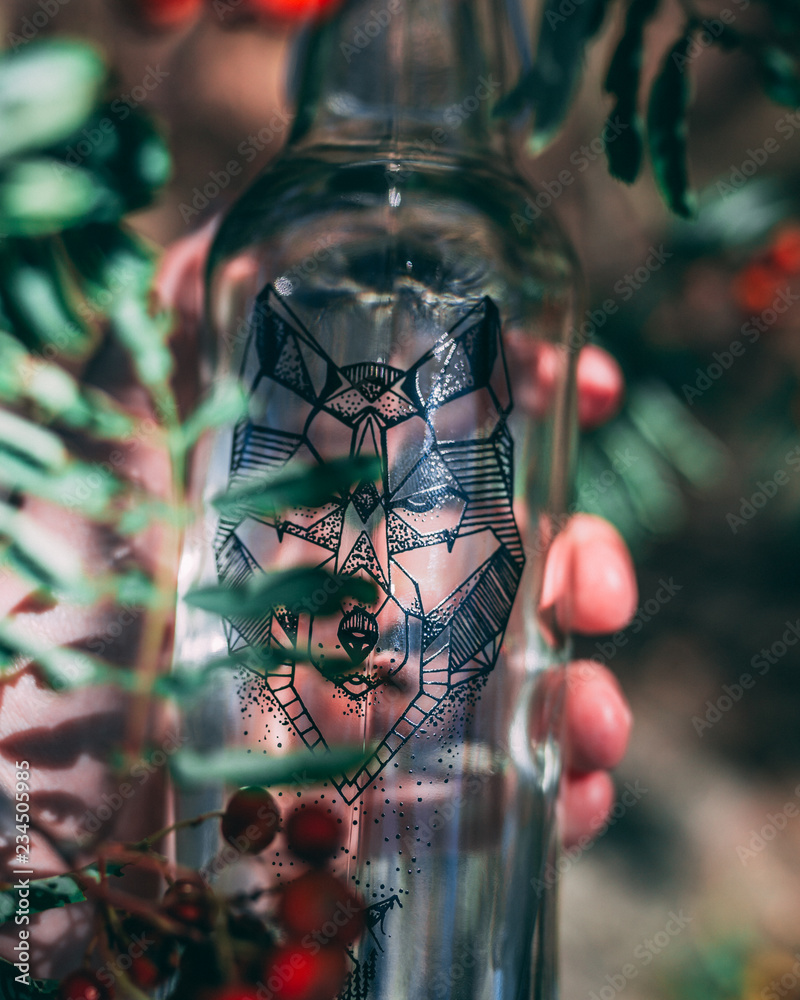 Water Bottle with Wolf Tattoo Design between Branches and Berries Stock ...