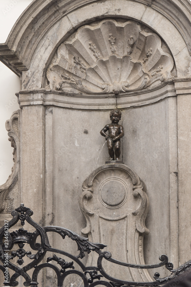 Manneken Pis is a small bronze sculpture, landmark of Brussels, Stock ...