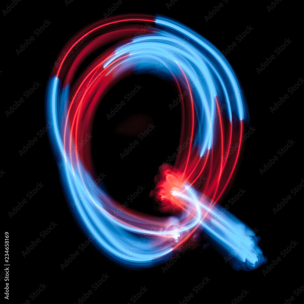 Letter Q of the alphabet made from neon sign. The blue light image ...