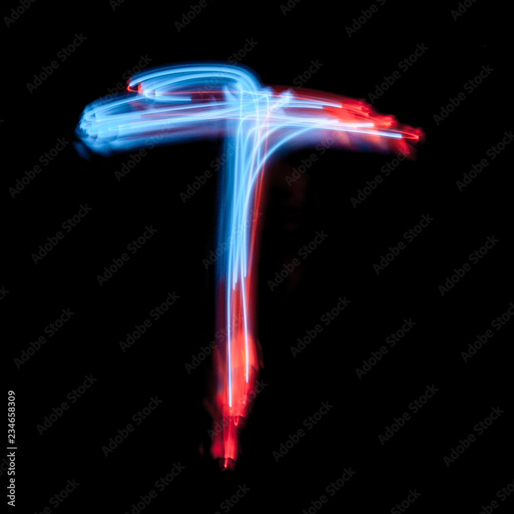 Letter T of the alphabet made from neon sign. The blue light image ...