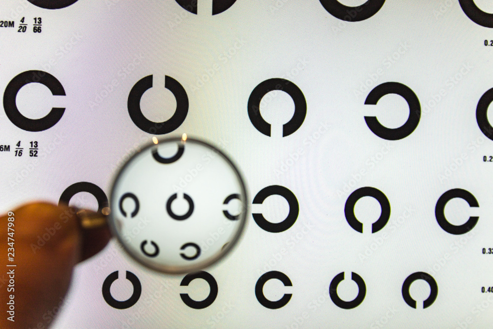 negative concave ophthalmic lens on a blurred background of the Stock ...