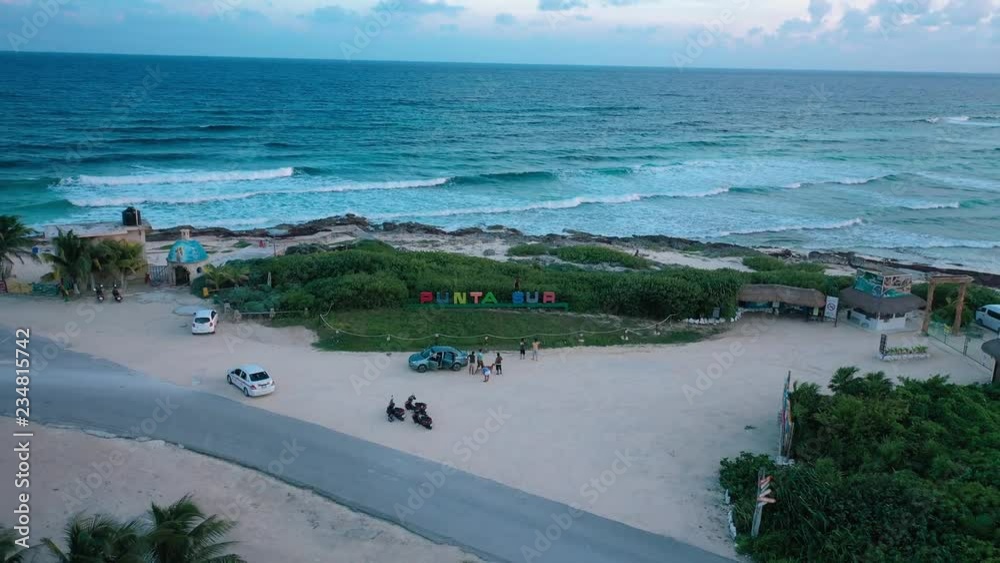 Drone shot of people in Punta Sur beach park near Caribbean sea ...