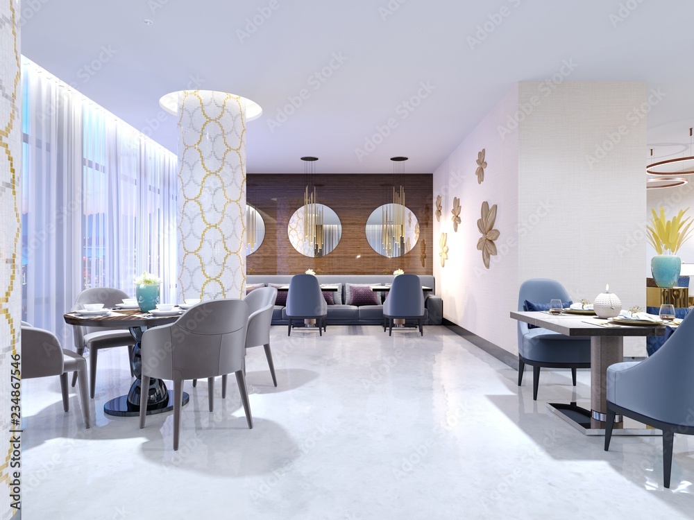 The hotel’s luxurious, bright restaurant with four and two chairs and ...