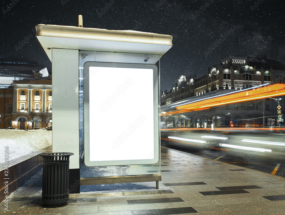 Bus stop at city night with blank white illuminated poster. Stock Photo ...