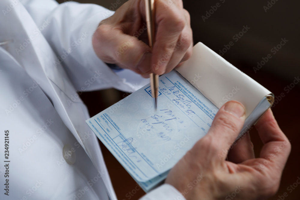 Dr. Writing a Prescription Stock Photo | Adobe Stock
