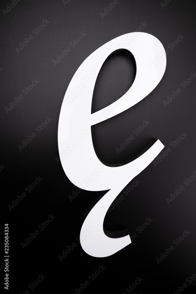 Litera ę. Biała przestrzenna litera na czarnym tle. Stock Photo | Adobe ...