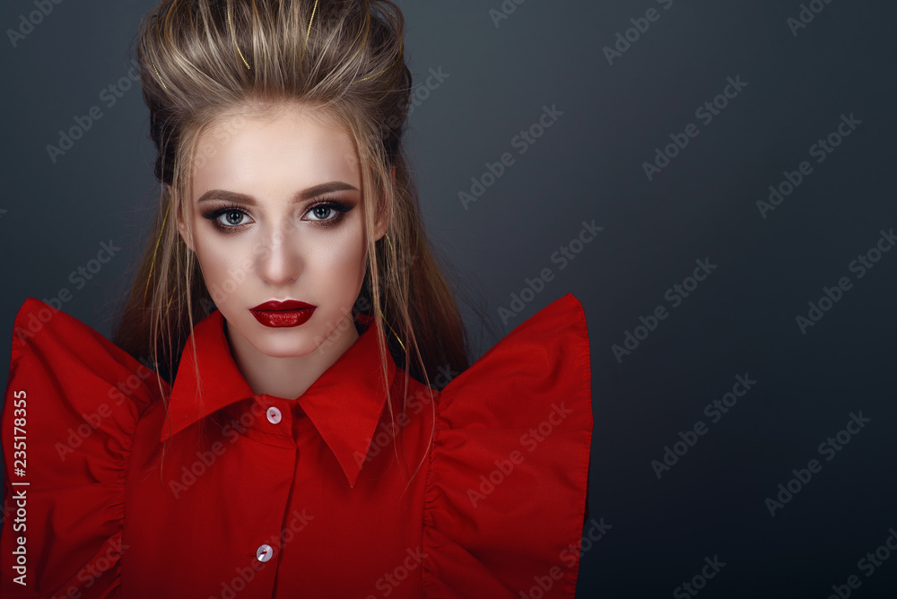 Portrait of beautiful young blond model with perfect provocative make ...