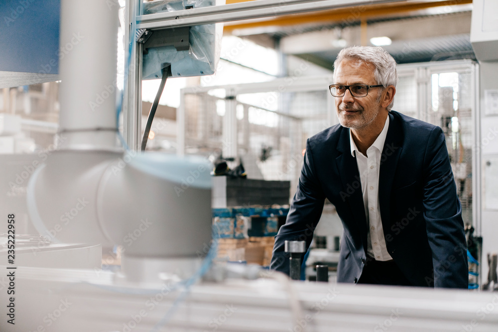 Manager smiling in high tech company Stock Photo | Adobe Stock