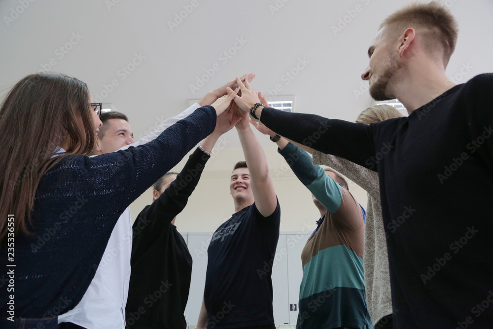 Group of young students in technical vocational training celebrating ...