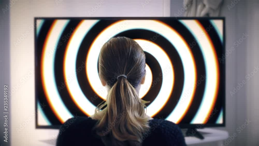Hypnosis TV Brainwashing Girl Watching Television Young Woman Hypnosis TV Brainwashing Girl Watching Television Young Woman
