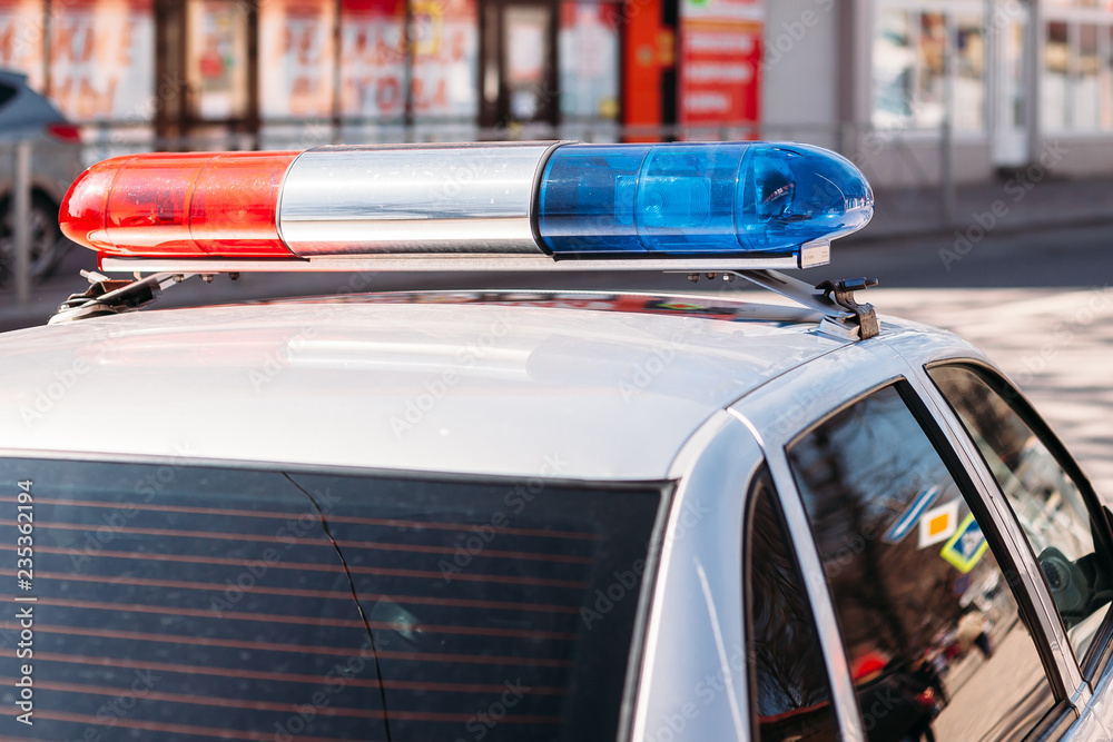 flashing light police car Stock Photo | Adobe Stock