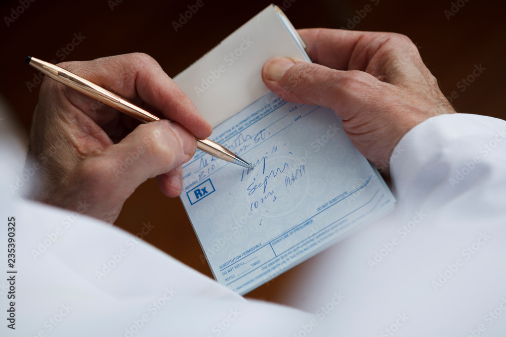 Dr. Writing a Prescription Stock Photo | Adobe Stock