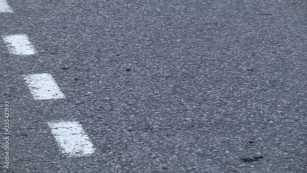 asphalt road under the blue sky. Road marking. White line on new ...