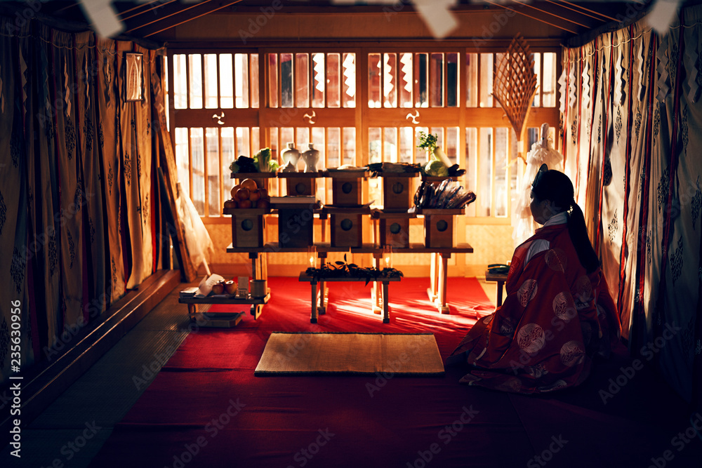 Woman wearing traditional clothing in temple Stock Photo | Adobe Stock