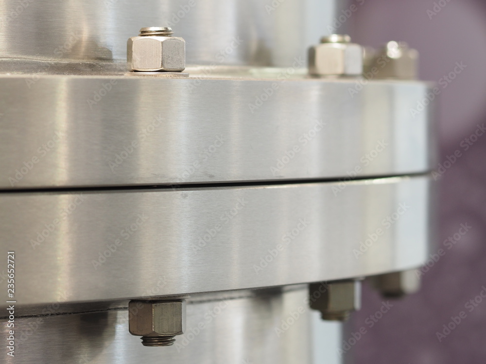Industrial stainless bolted steel flange connection on pipework Stock ...