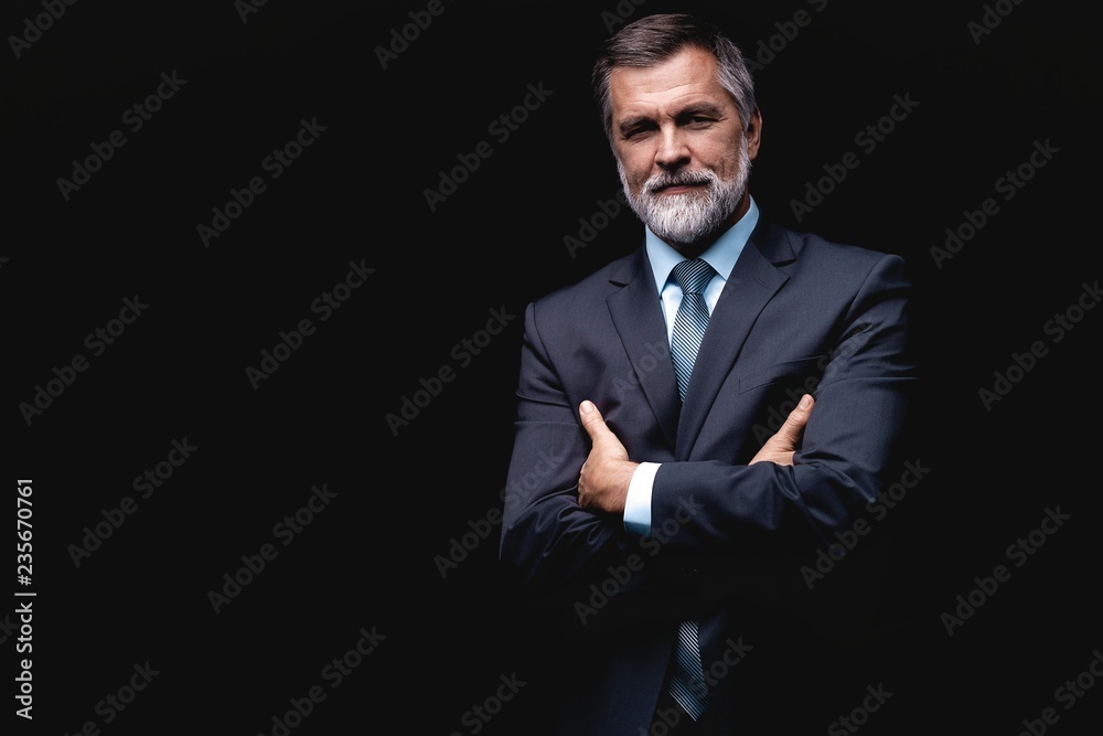 Handsome mature business man isolated on black background Stock Photo ... Handsome mature business man isolated on black background Stock Photo ...
