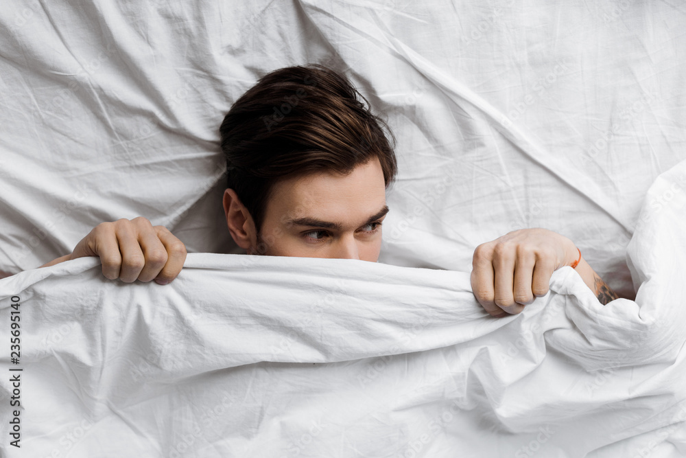 Man Hiding Under The Bed