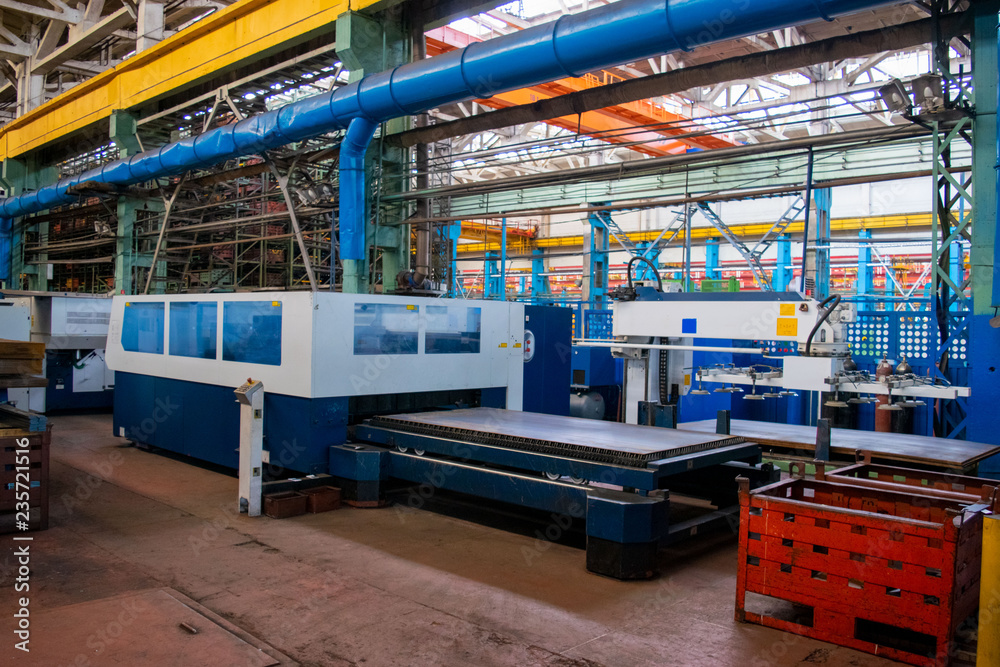 Metal lathe. The production process in an industrial factory for the ...